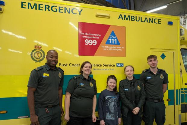 Young survivor reunites with paramedics after life-changing injury