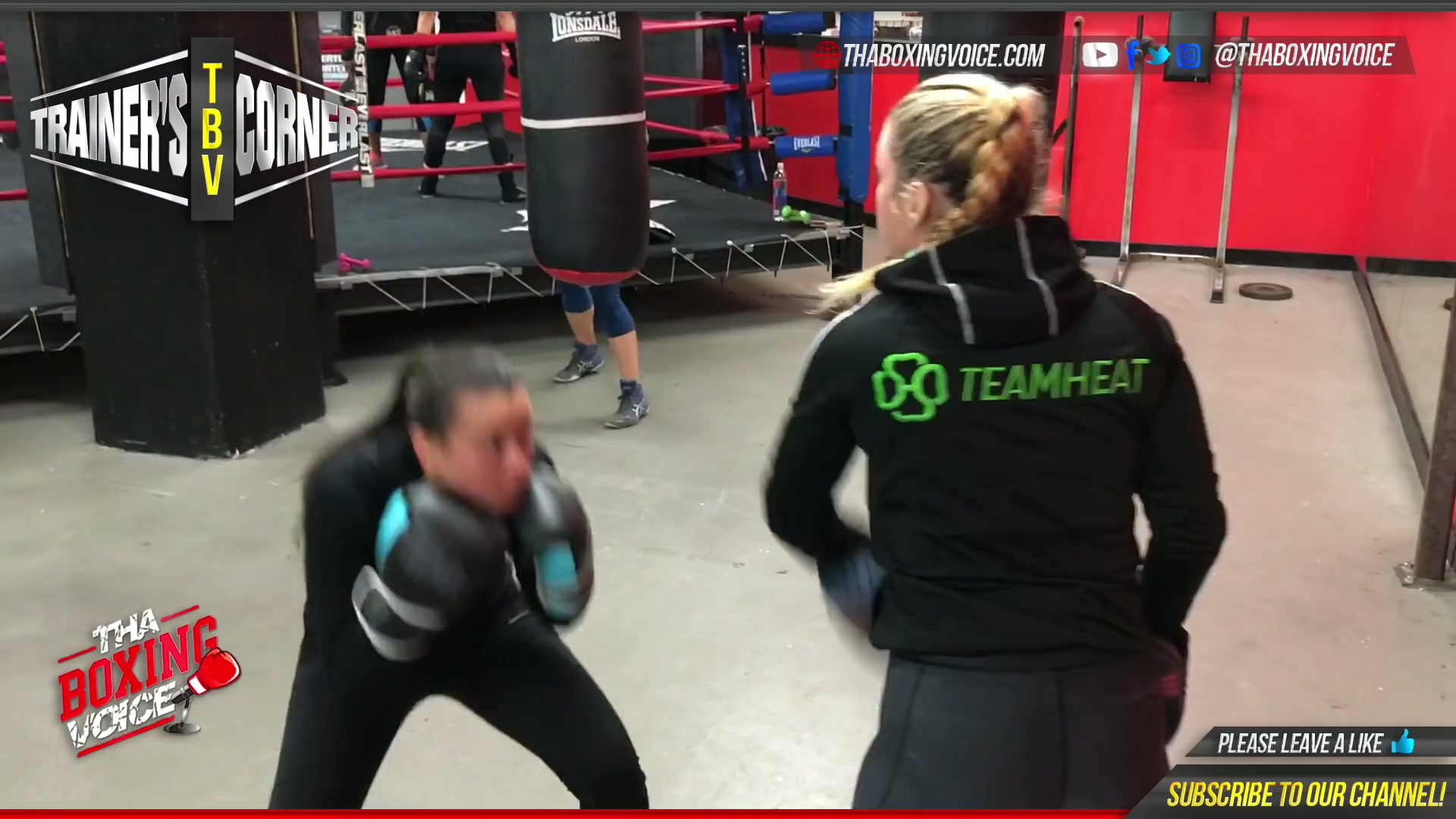 Heather Hardy teaching 'The Heat' to female boxer in training