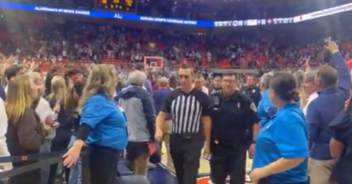 Auburn fans throw objects at officiating crew after controversial ...