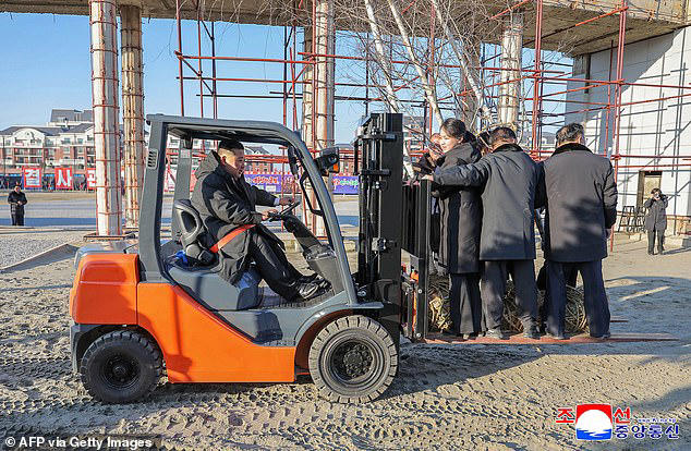 Kim Jong-UP? North Korean leader gives his daughter and staff a lift at ...
