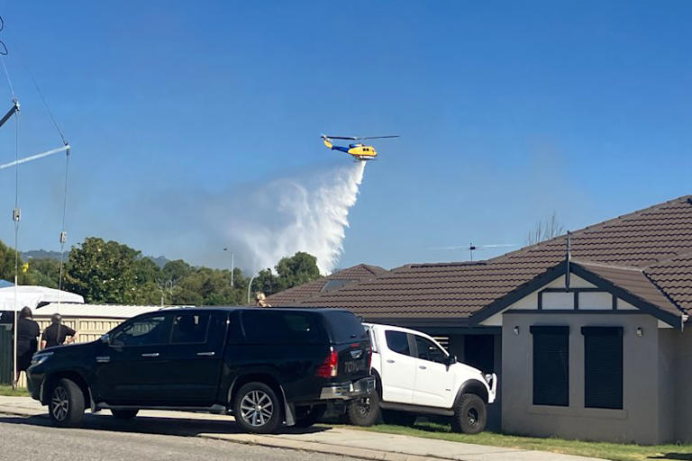 High Wycombe bushfire downgraded as motorists caught in traffic chaos