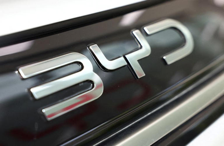 China's BYD promises new versions of plug-in hybrids with longer range ...