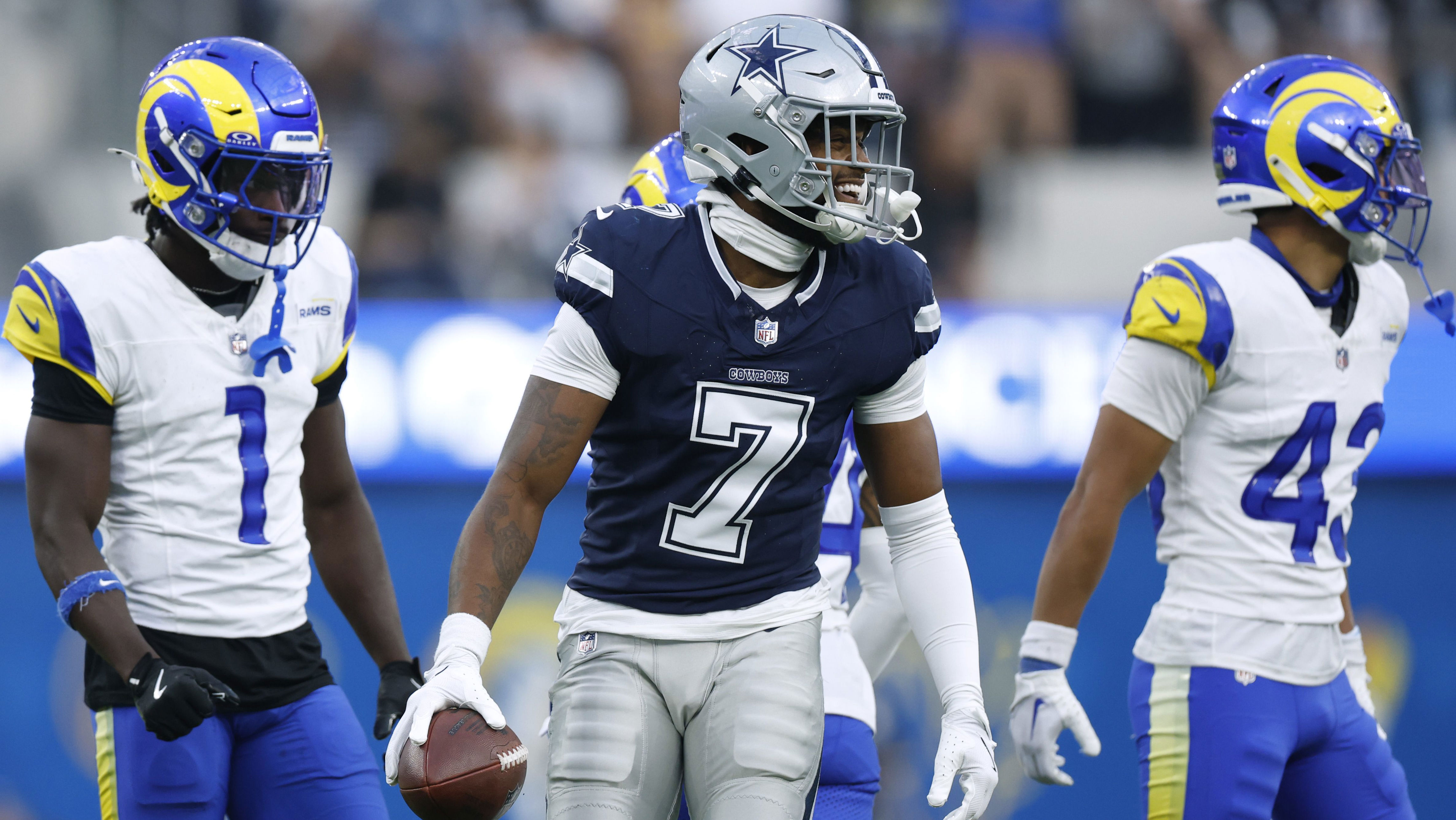 Cowboys bring back record-setting RB, promising WR in flurry of roster moves