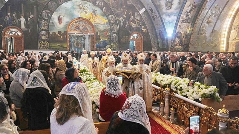 Egypt's Coptic Orthodox Christians attend mass to celebrate Christmas Eve
