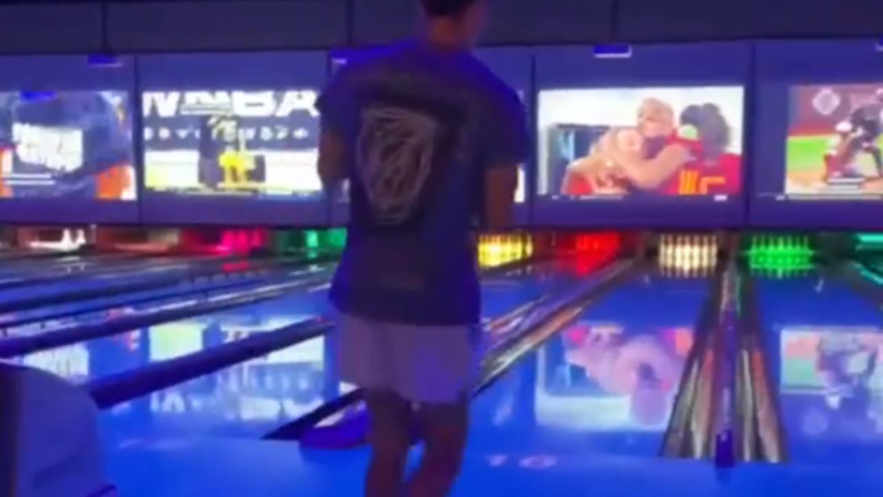 Guy glides bowling ball in unusual way and strikes every pin perfectly