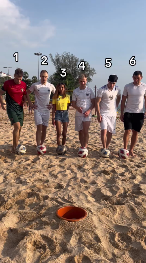 Football guessing game at the beach with a twist