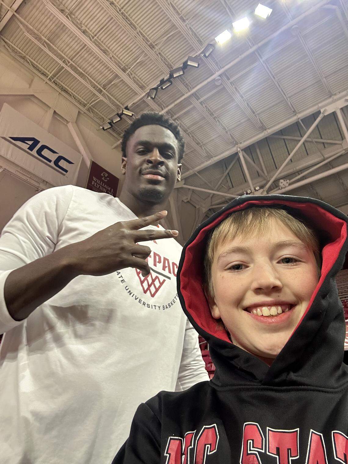 NC State hoops players take selfies with young fan at BC. His Pack ties ...