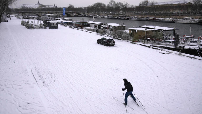 Europe faces further travel chaos as deadly cold snap brings more snow
