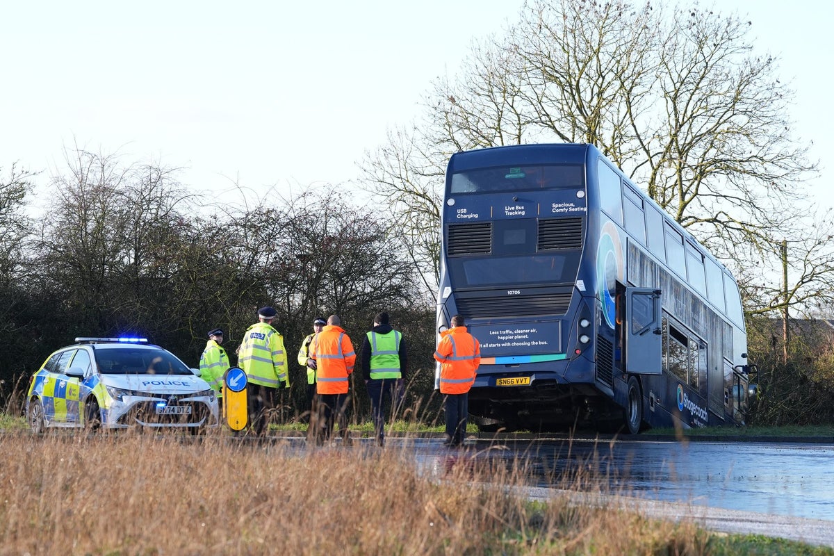 UK weather live: School bus crashes as fresh weather warnings issued