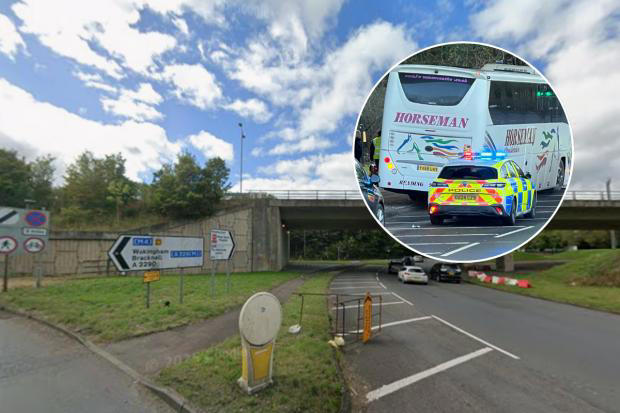 Eighteen injured in crash between school coach and bus