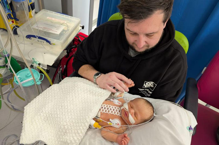 'Our eight-day-old son had six-hour operation to replumb his back to ...