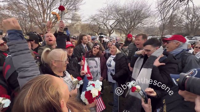 Ashli Babbitt's mother leads chants for her outside the US Capitol