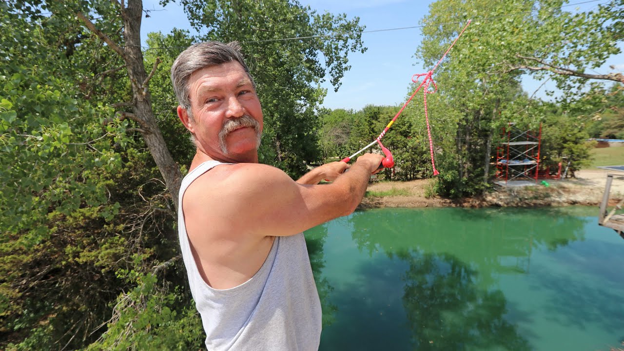 Grandpa goes off huge rope swing in wild stunt