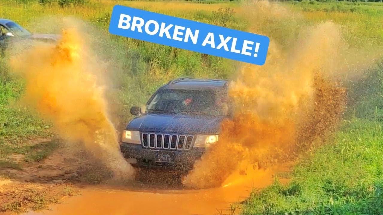 Jeep mudding a rust bucket to the limit