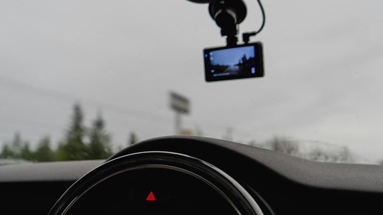 Dashcam captures semi truck launching over median in near-miss chaos
