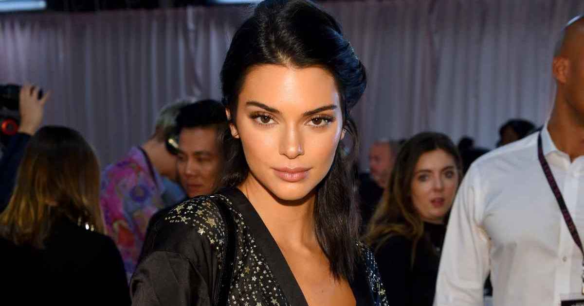 Kendall Jenner dons just a robe in Tory Burch photos
