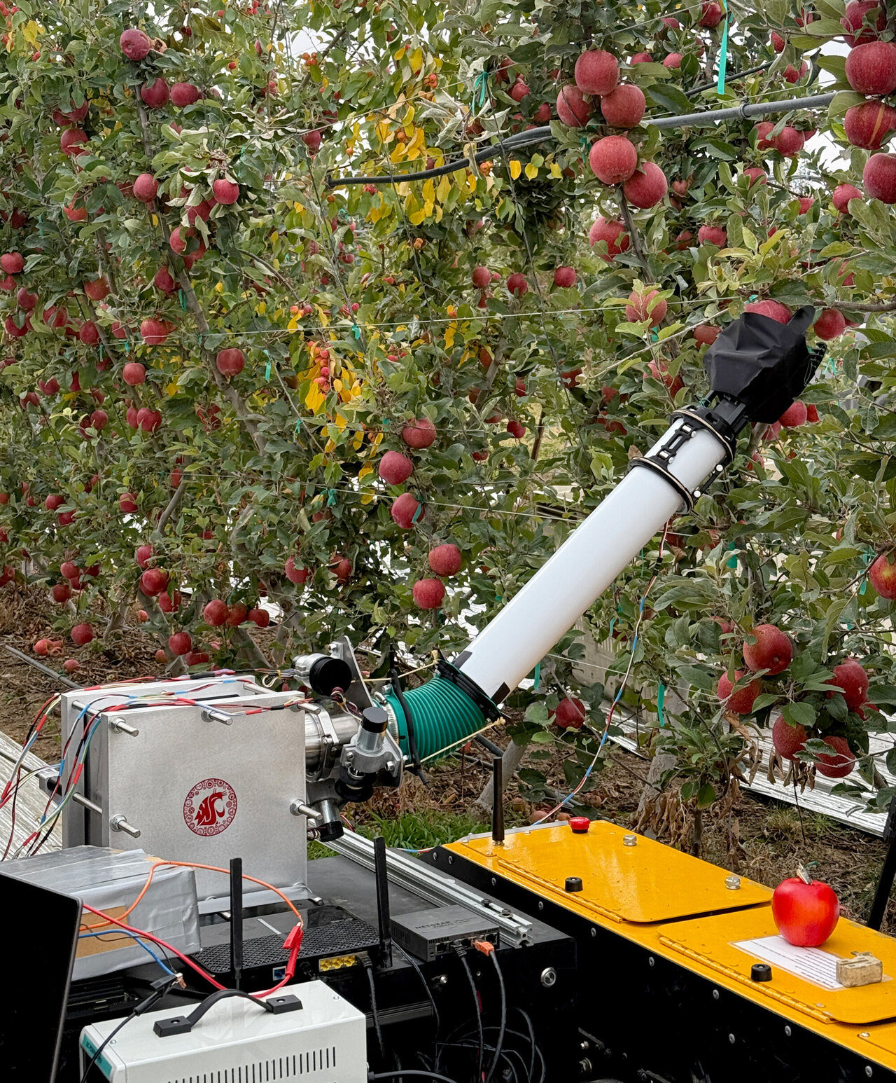 Inflatable fabric robotic arm picks apples