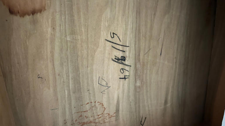 Woman finds hidden surprise with mysterious inscription in 1940s home
