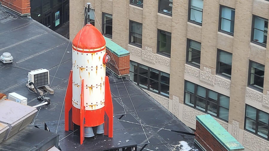 Why is there a rocketship on a downtown Boston roof?
