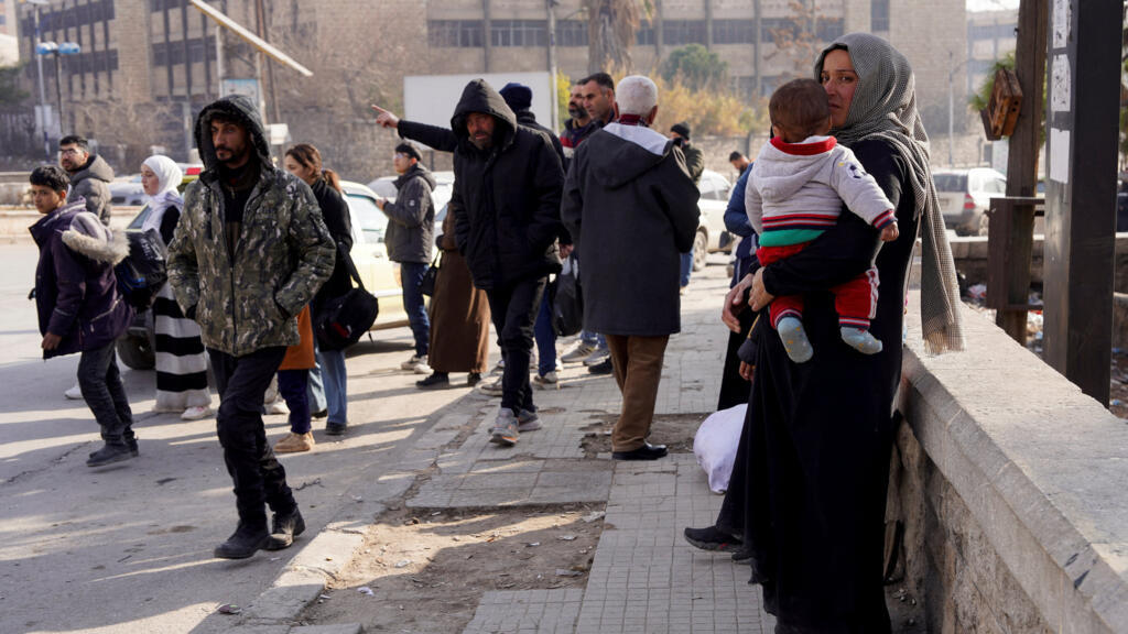 Civilians flee Kurdish areas of Aleppo as Syrian army begins shelling