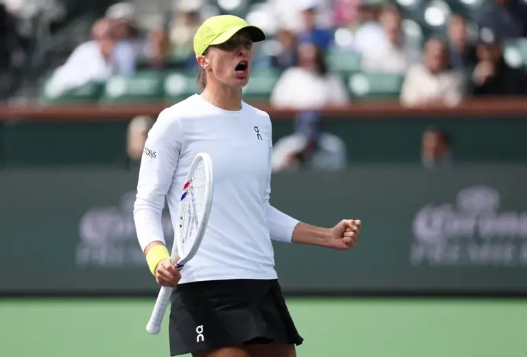 Video — Swiatek's racket toss sends ball over net but point ruled ...