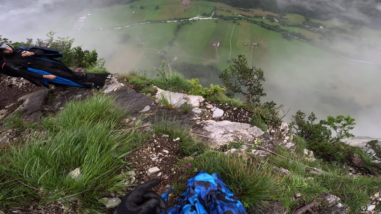 Morning wingsuit BASE jump from High Nose in Switzerland
