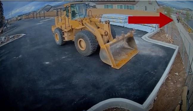 Watch: Man tries to run over Nevada officers with front loader