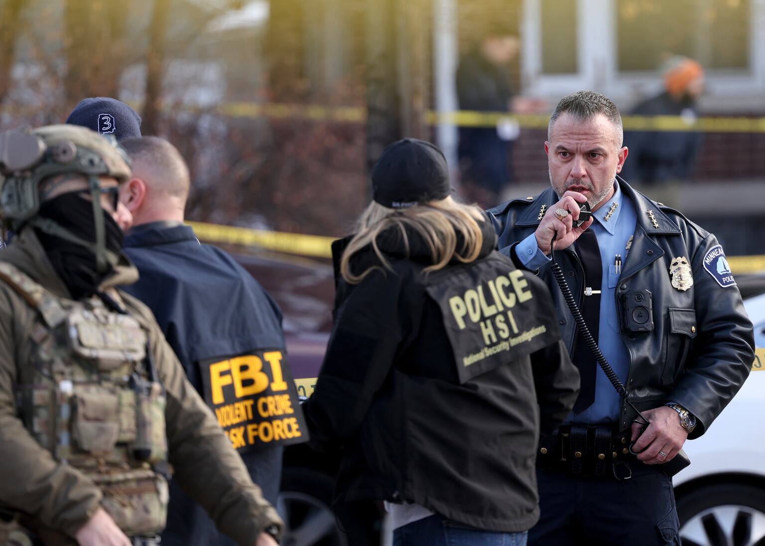 Protests after ICE officer shoots woman dead in immigration crackdown