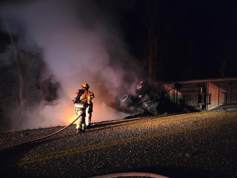 Washington County semi rolls downhill, driver safe