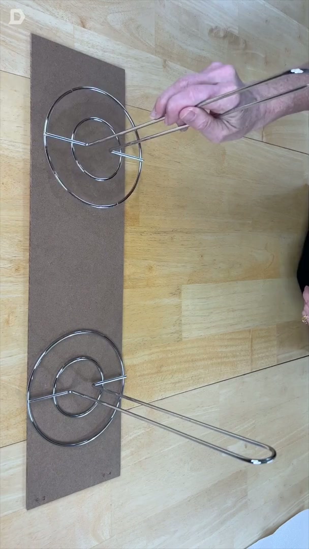 Grab a Dollar Tree paper towel holder...