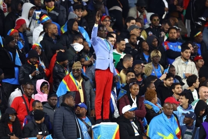 Viral Lumumba fan becomes flashpoint after Algeria player mocks his pose