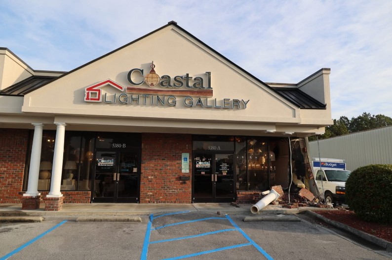 Store damaged as car slams into building in North Carolina
