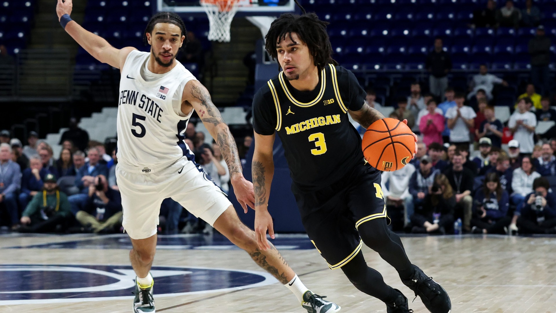 Michigan survives road scare over Penn State, improves to 14-0