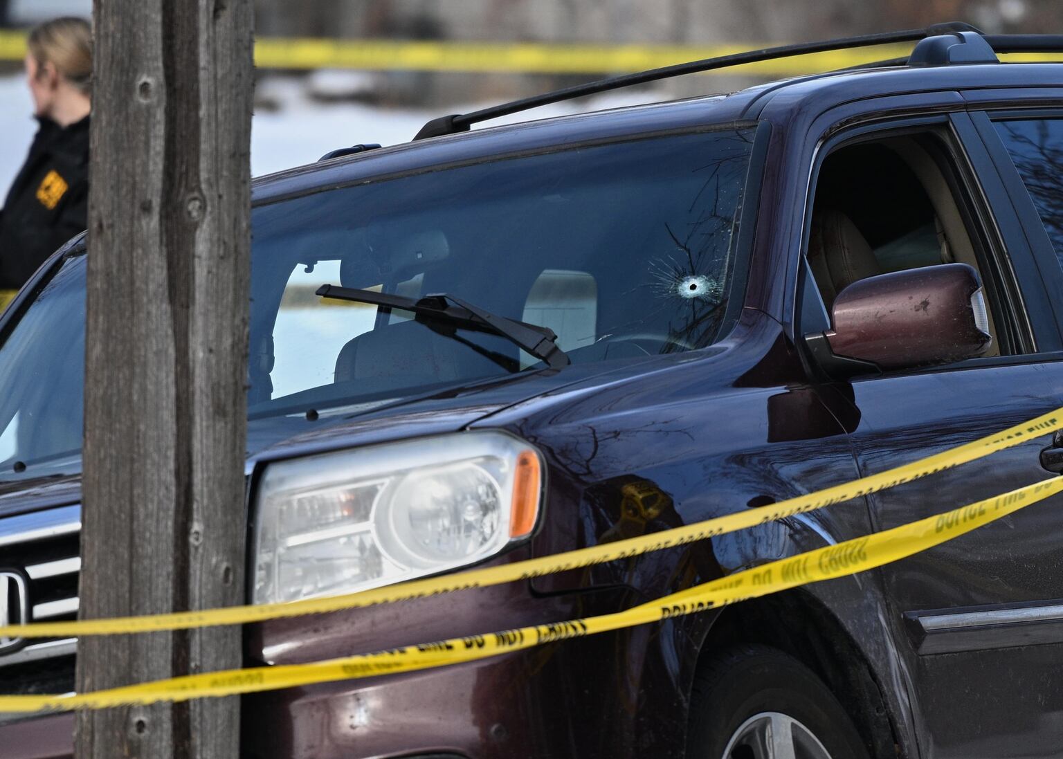 Protests after ICE officer shoots woman dead in immigration crackdown