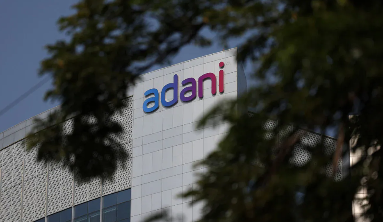 Adani partners with Brazil's Embraer to make regional jets in India for ...