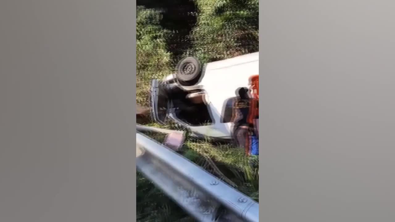 Minivan overturns on bend killing two passengers and injuring 13 more