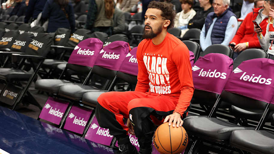 Trae Young trade news broke while he was sitting on the bench during ...