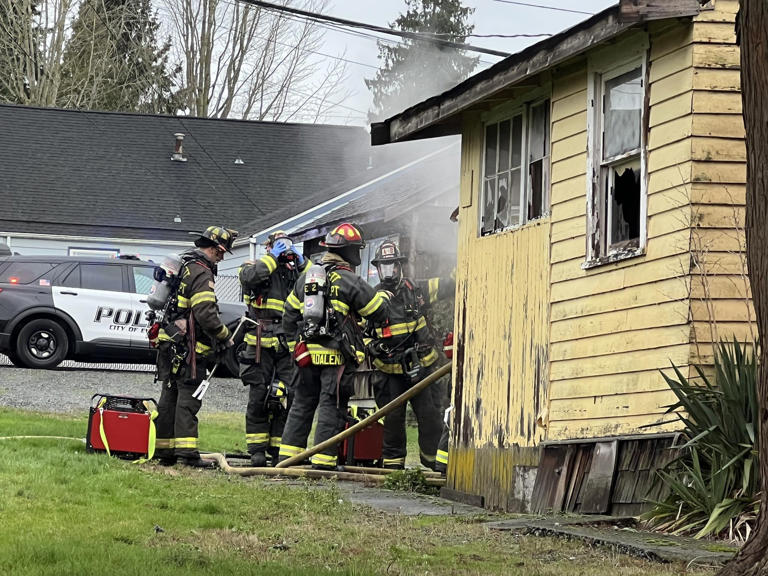 Crews say unattended candle caused Everett house fire