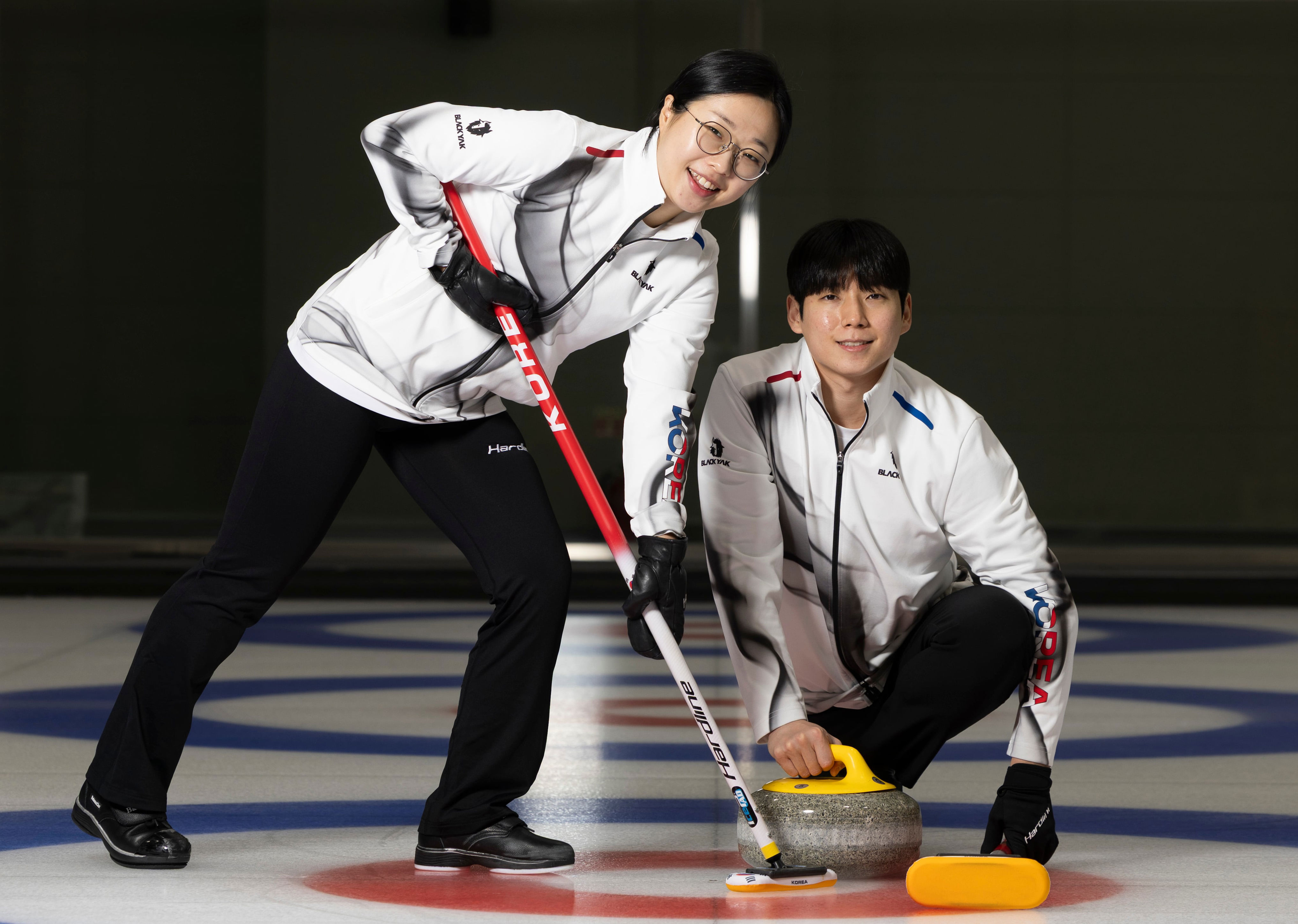 Reverse strategy curling duo defeats world No. 1