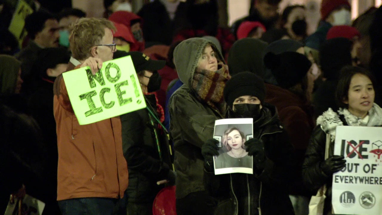 Around 200 protest fatal ICE shooting in front of Seattle's federal ...