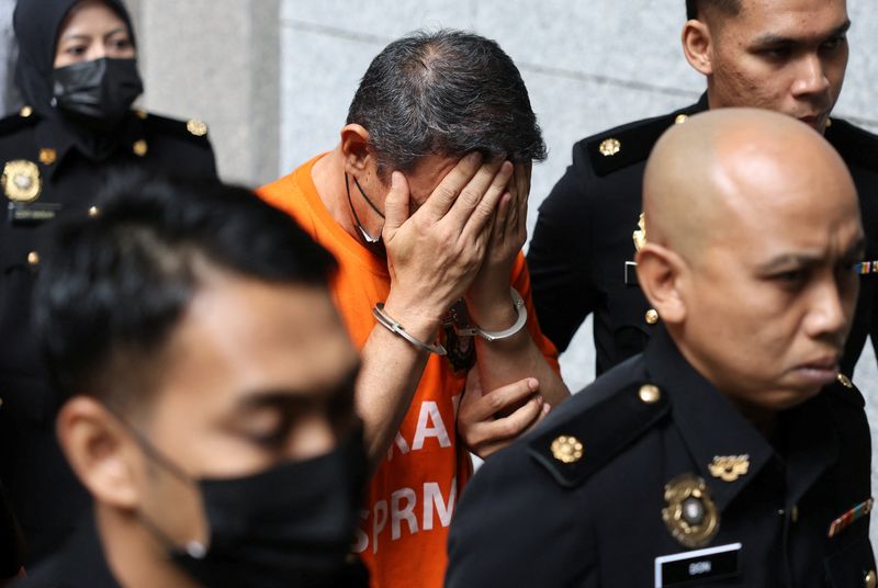 Malaysia detains former army chief in military contract bribery probe