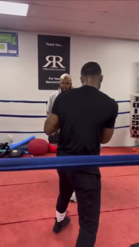 Allen Green & coach Mustafa keep it simple working the jab during a ...
