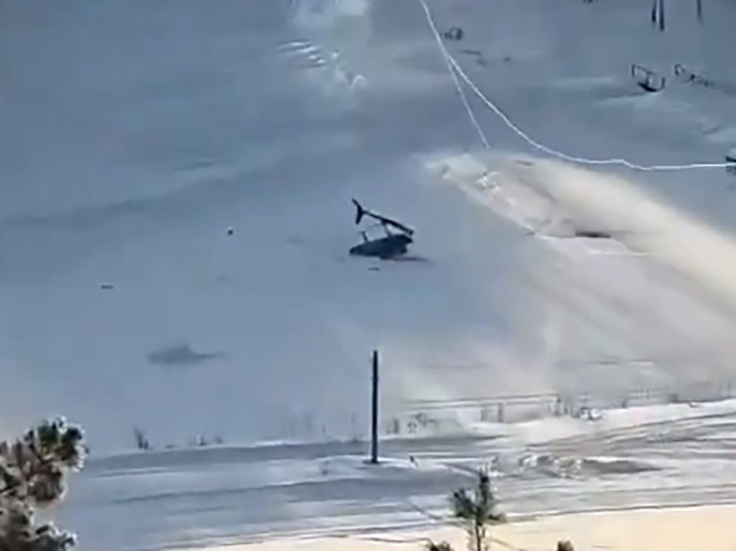 Helicopter crashes into ski lift, killing two
