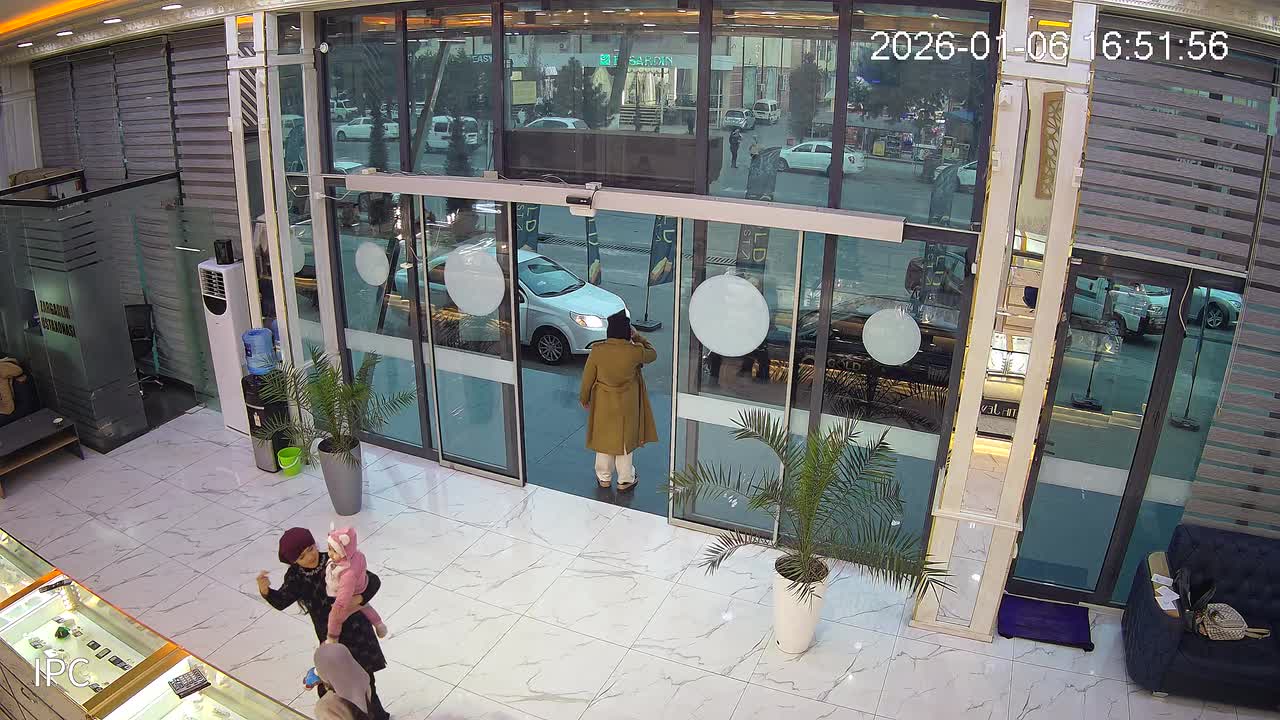 Birthday cake sparklers cause balloons to explode in woman's face