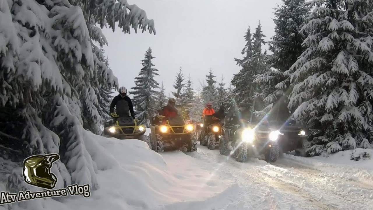 Winter ATV ride through deep snow trails