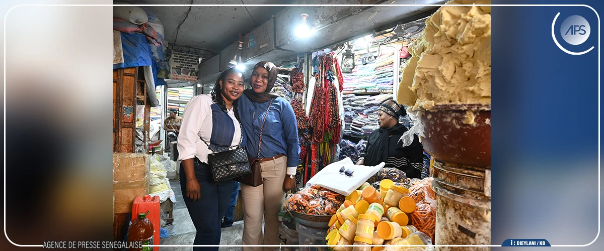 CAN 2025 : au marché malien de Dakar, des supporters des Aigles lancent ...
