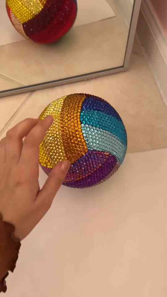Bedazzling a rainbow volleyball - sparkly DIY transformation