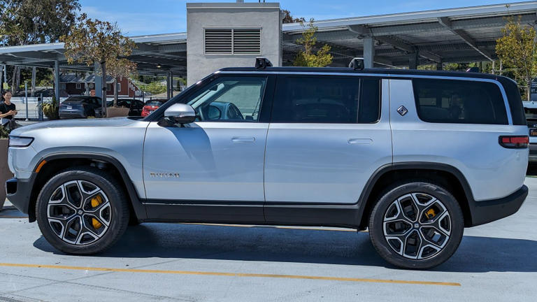 Rivian owners resort to parachute cords to fix a stubborn door handle flaw