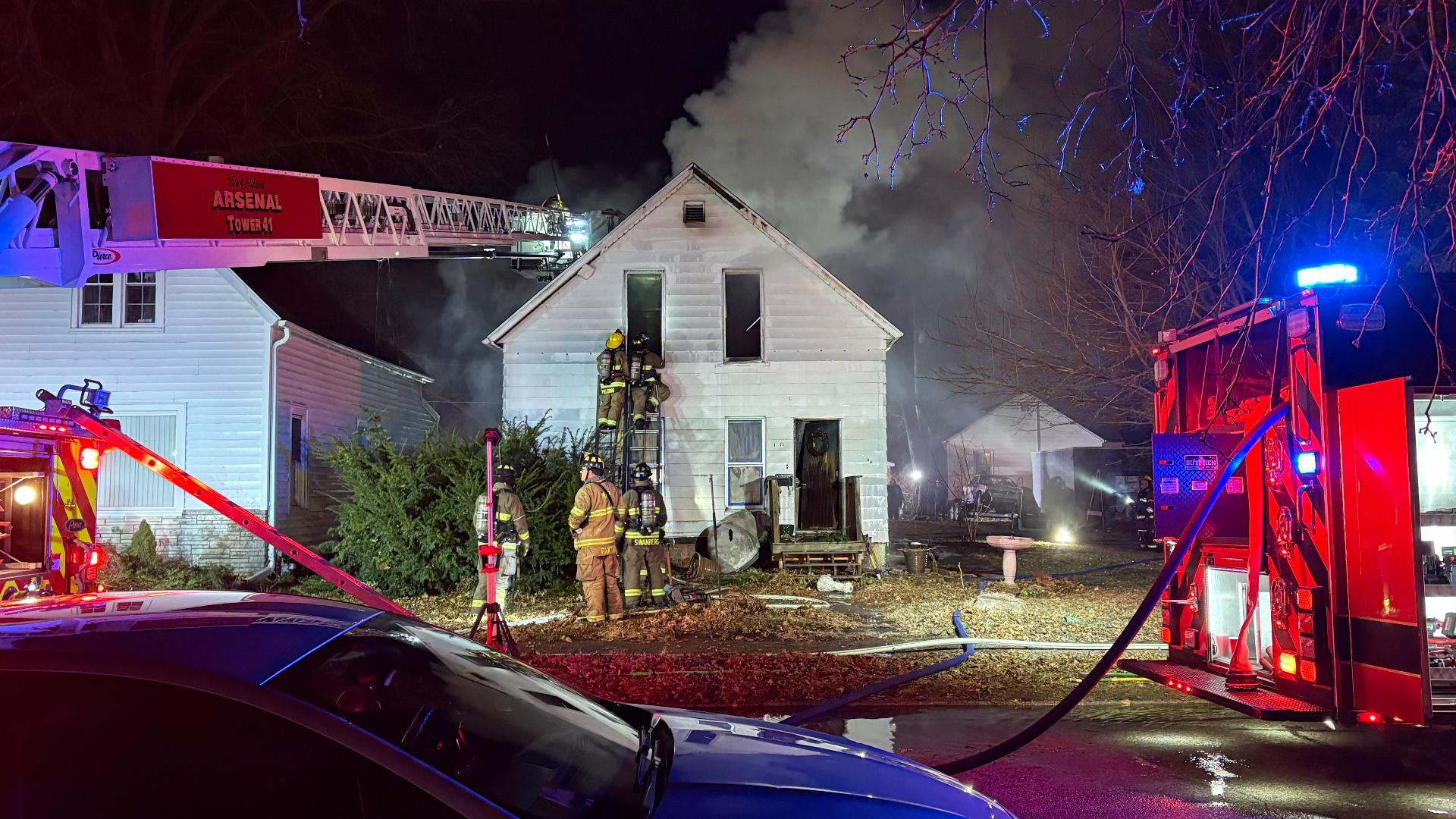 Moline firefighters battle Thursday morning house fire on 4th Street