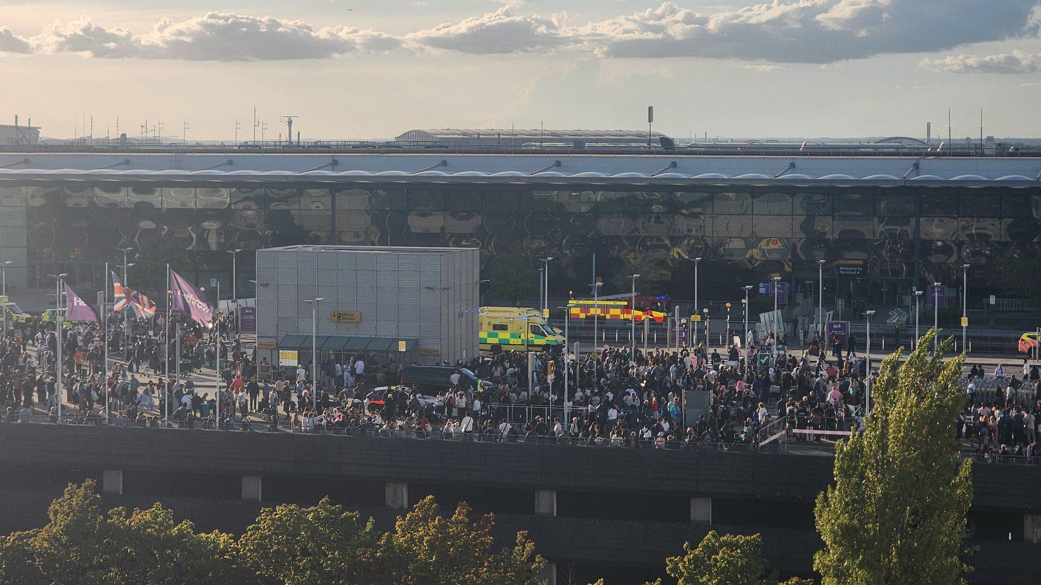 Three deny CS spray robbery at Heathrow Airport